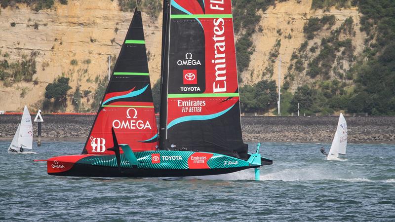 Emirates Team New Zealand's AC75 passes through a 420 training session ...