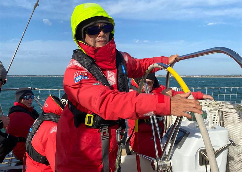Chee Wah at the helm - Clipper Round the World Race