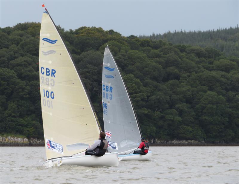 Two Finn class dinghies in close company; Mark Crowther leads Stewart ...