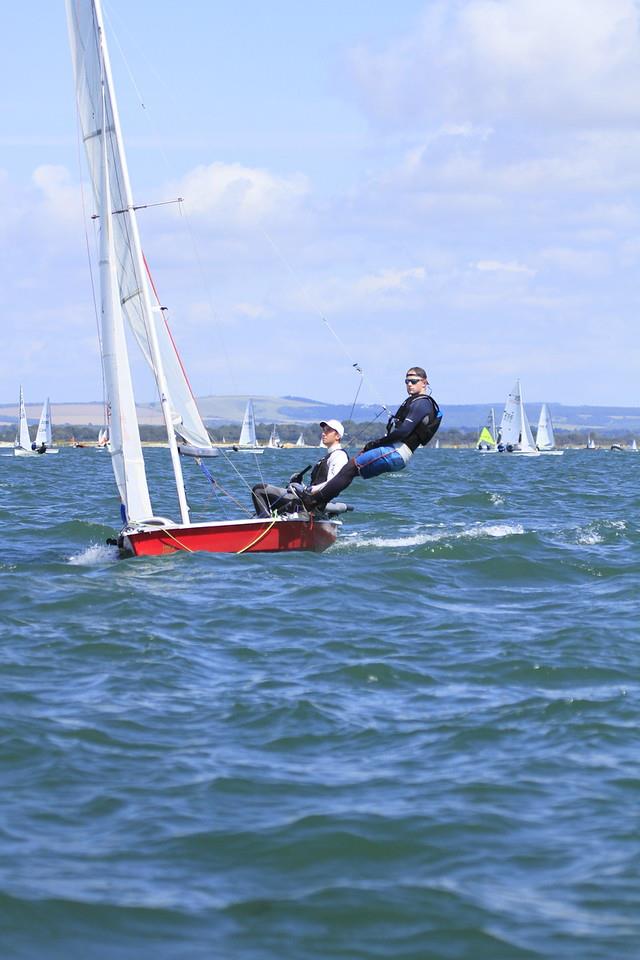 Patrick and Adam sailing a Laser 4000