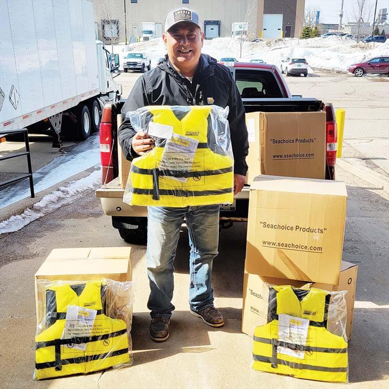 Bart Shanks from Hub's Yacht Club and Marina in Minnesota with donated ...