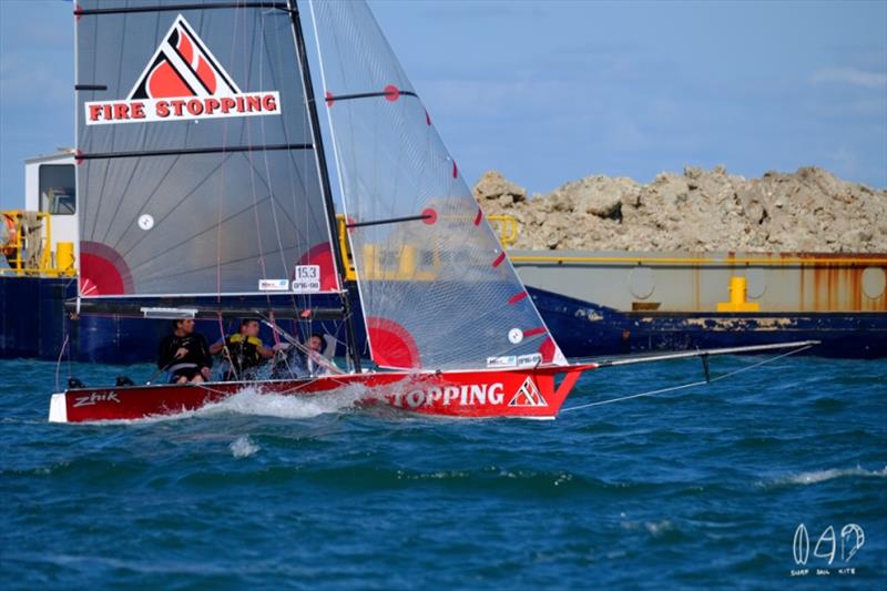 Fire stoppping on the upwind beat past the barges