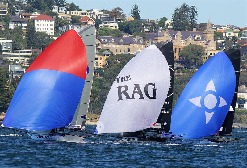Fleet racing by the group chasing the leader in race 5 of the 18ft ...