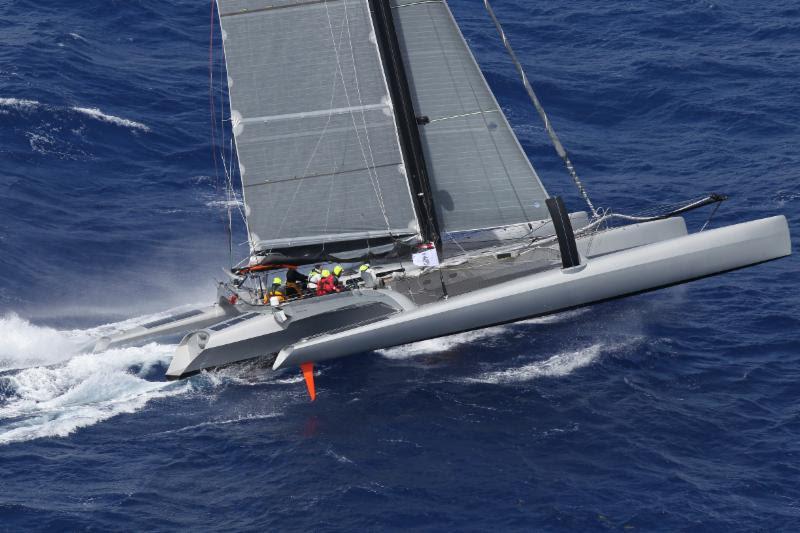 Peter Aschenbrenner's 63' trimaran Paradox is blasting round the course ...